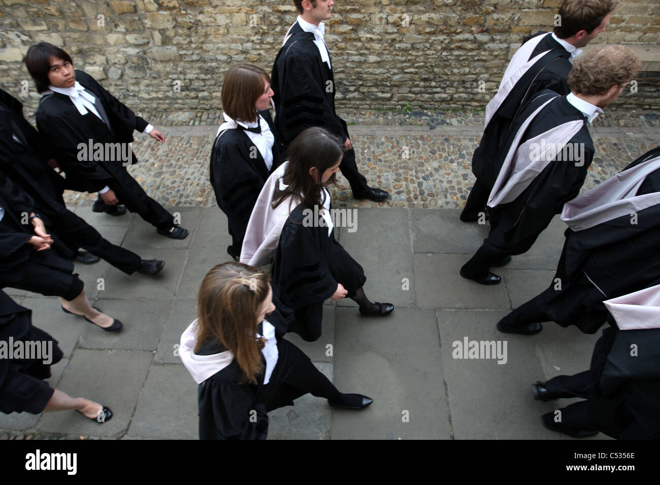 CAMBRIDGE UNIVERSITY STUDENTS GRADUATING AFTER PASSING THEIR EXAMS AND ...