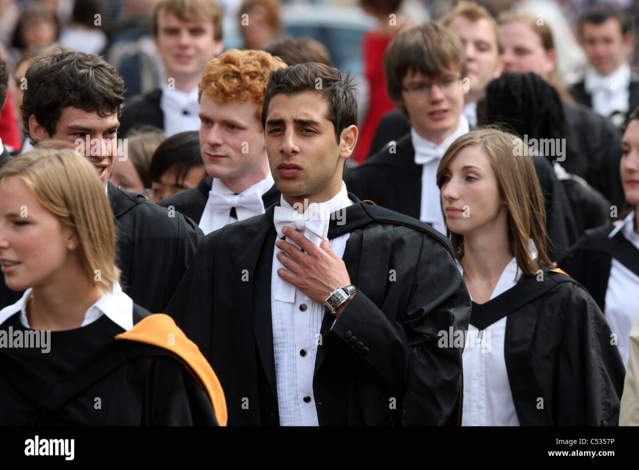 CAMBRIDGE UNIVERSITY STUDENTS GRADUATING AFTER PASSING THEIR EXAMS AND ...