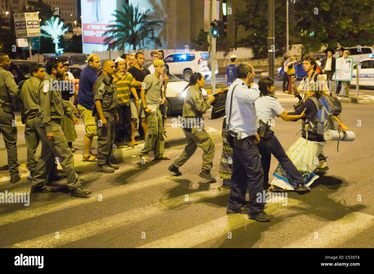 Riot police chase hi-res stock photography and images - Alamy