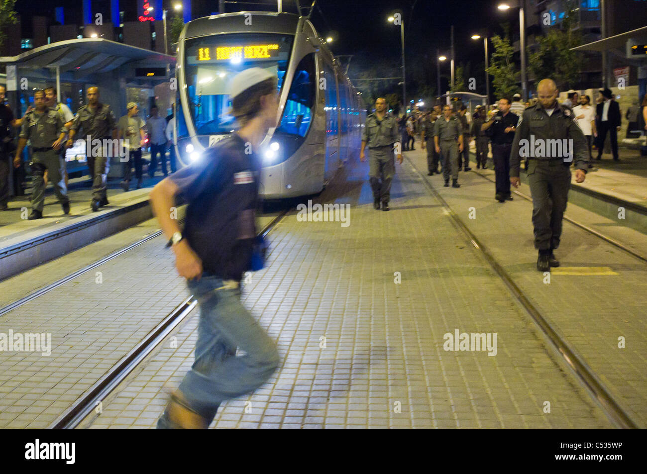 Riot police chase hi-res stock photography and images - Alamy
