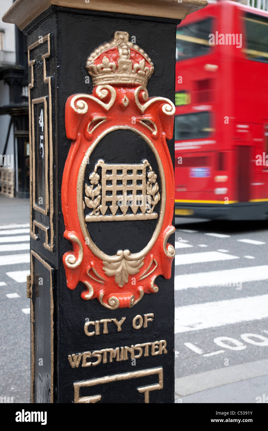 City of Westminster Sign with London Bus Stock Photo - Alamy