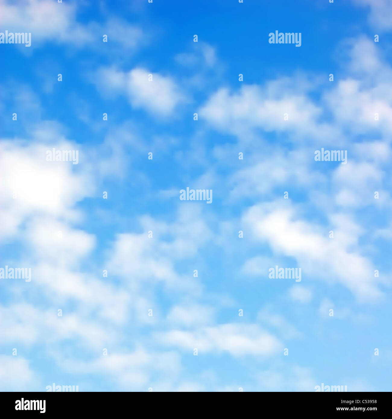 Illustration of fluffy white clouds in a blue sky Stock Photo - Alamy