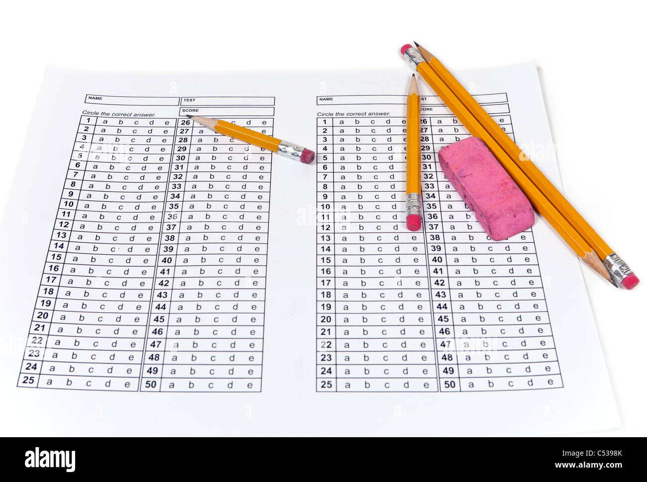 test answer sheet with pencils and eraser Stock Photo - Alamy