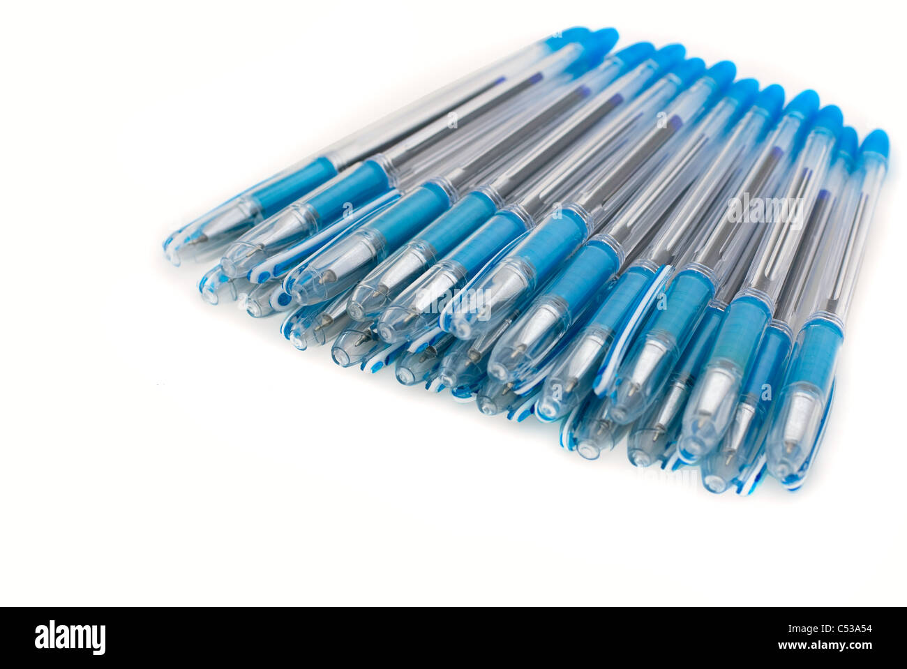 bunch blue pens on white background Stock Photo - Alamy