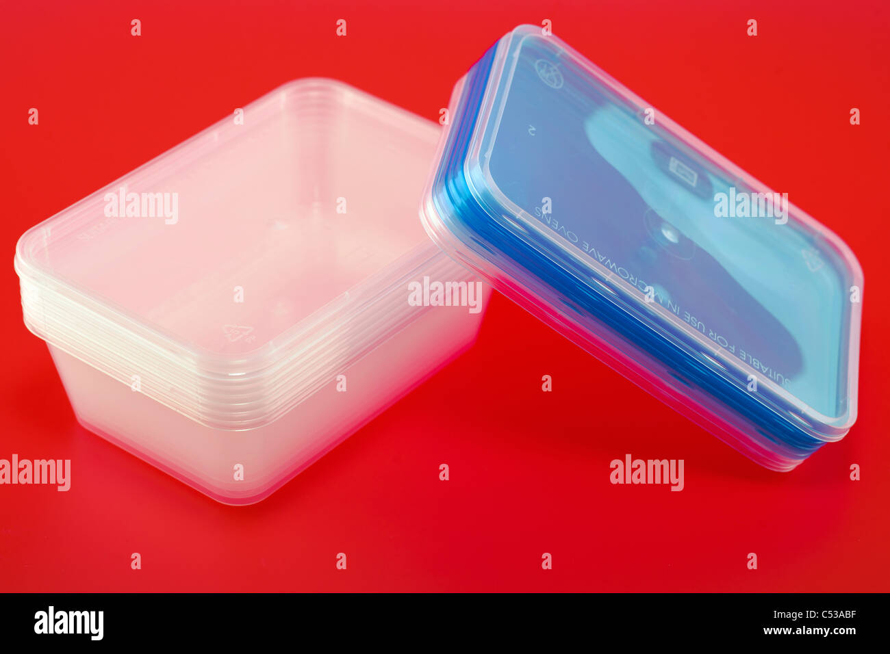 Pile of microwavable light plastic food containers with lids Stock ...
