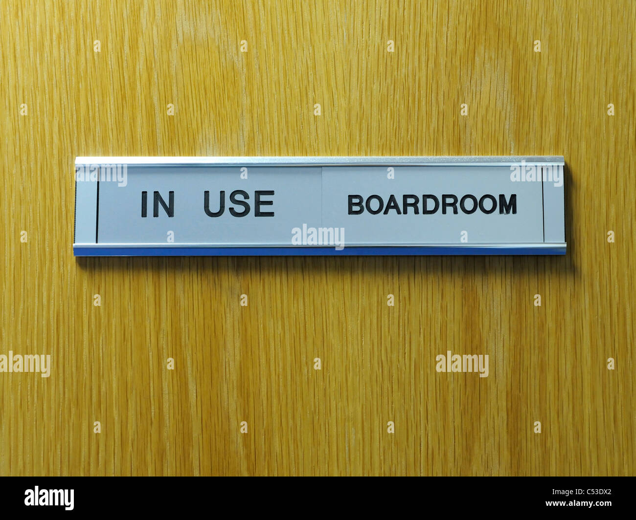 Boardroom in use sign Stock Photo - Alamy