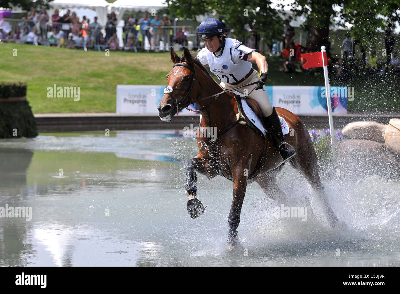 Pippa Funnell riding Billy Shannon (Great Britain) in the water. Cross ...
