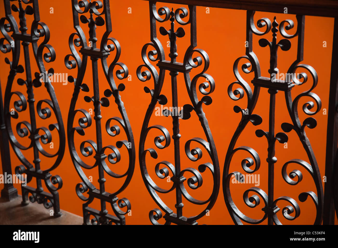 Wrought iron ornate railing on a balcony Stock Photo - Alamy