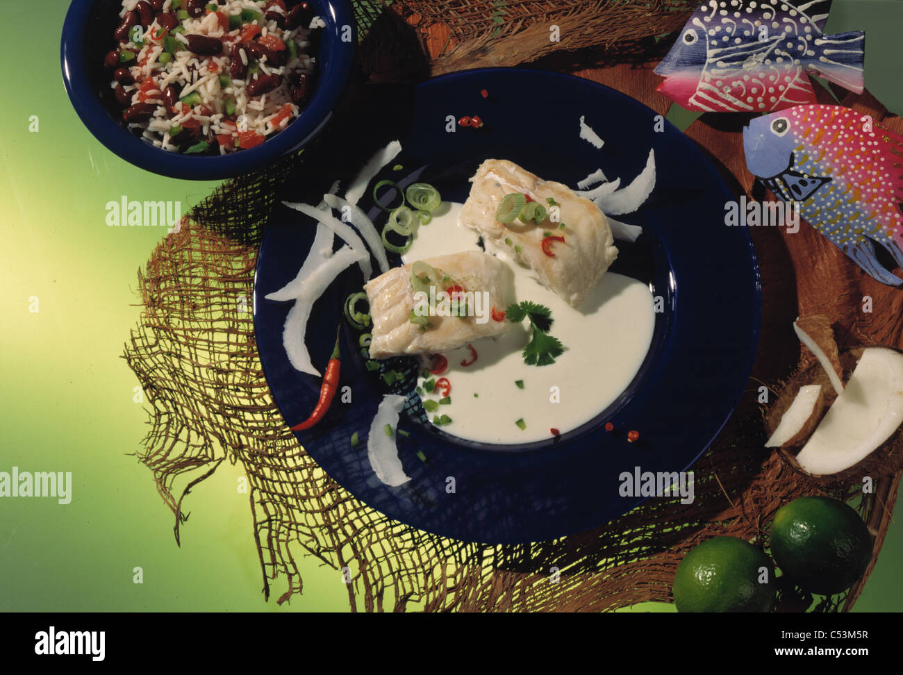 Coconut fish with congris Stock Photo - Alamy