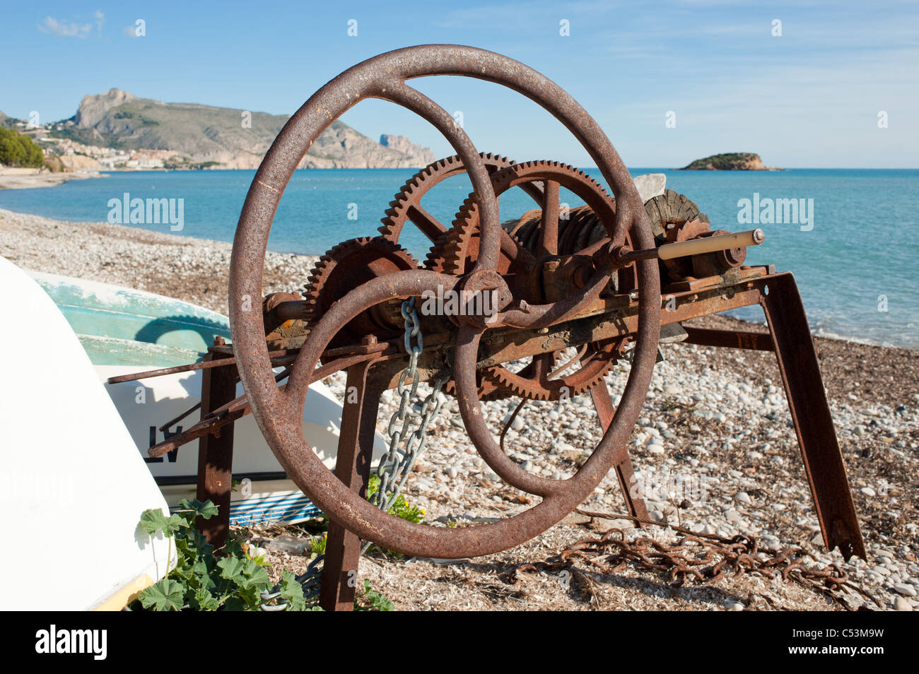 Traditional towing machinery for fishing boats on a beach Stock Photo ...