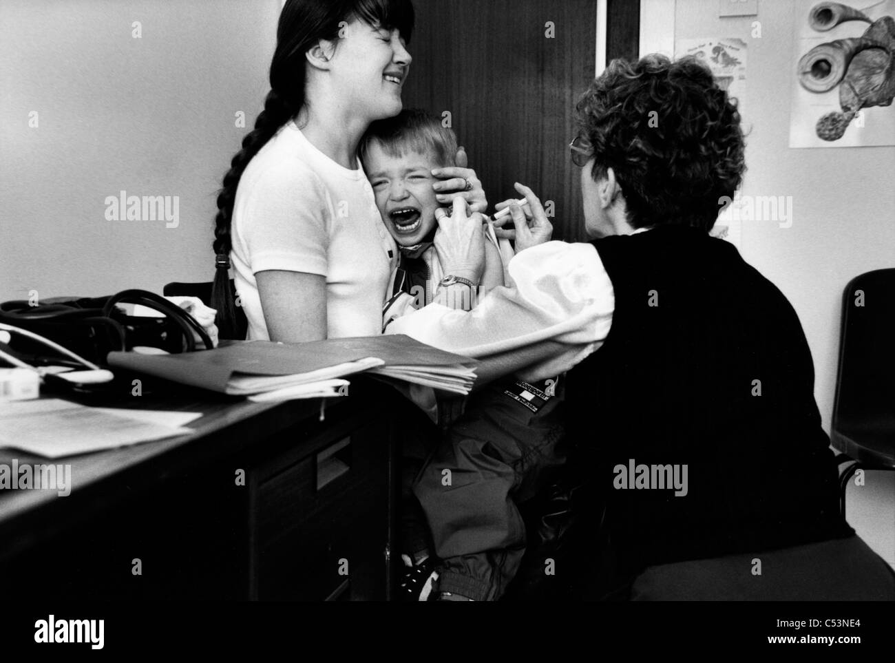 Cradled hi-res stock photography and images - Alamy