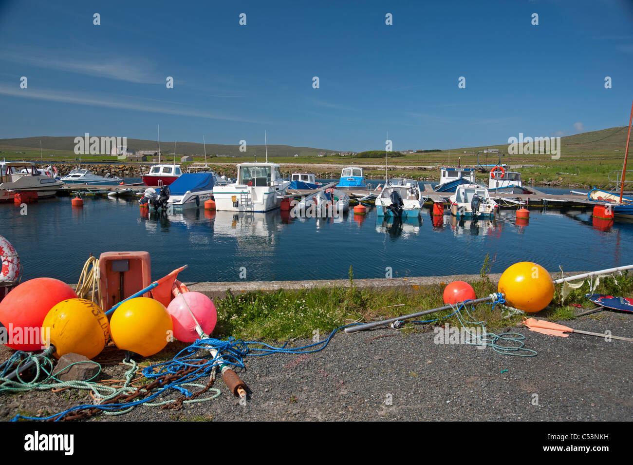 The colourful harbour at Baltasound, Unst Shetland Isles. SCO 7489. SCO ...