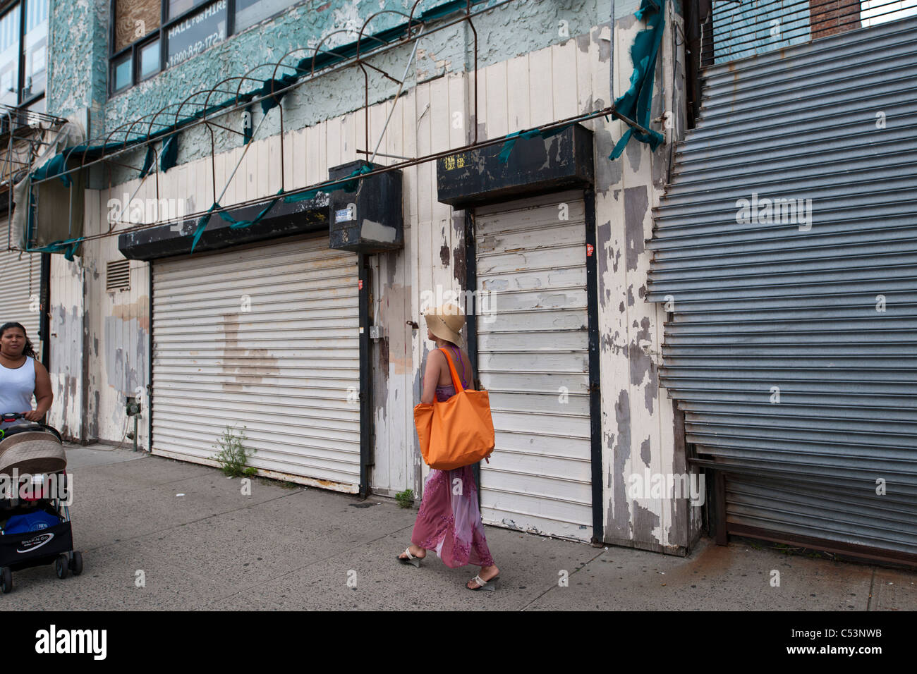 Closed storefronts at Rockaway Beach in the Queens borough of New York ...