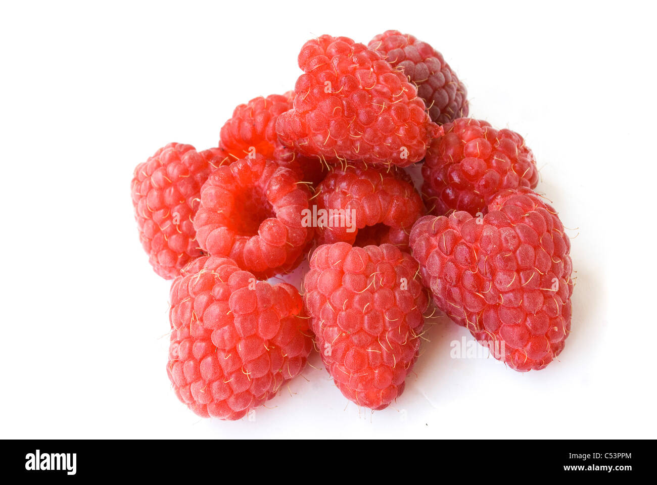 ripe red raspberries isolated on white background Stock Photo - Alamy