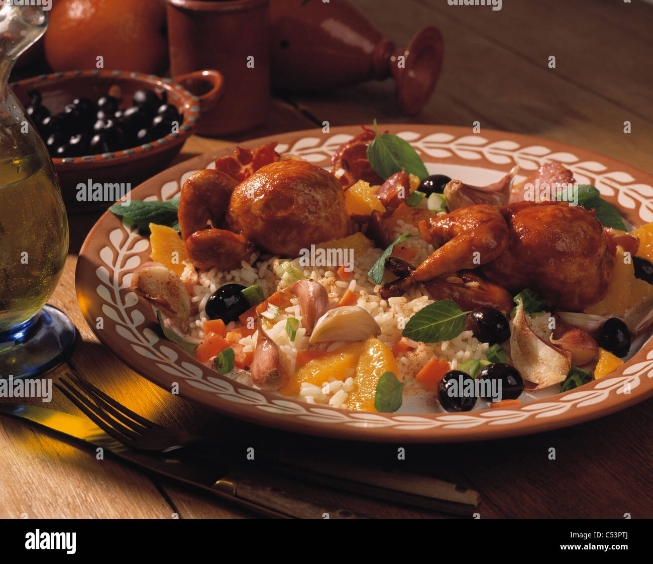 Orange - quail hot pod ( Arroz con codornices Stock Photo - Alamy