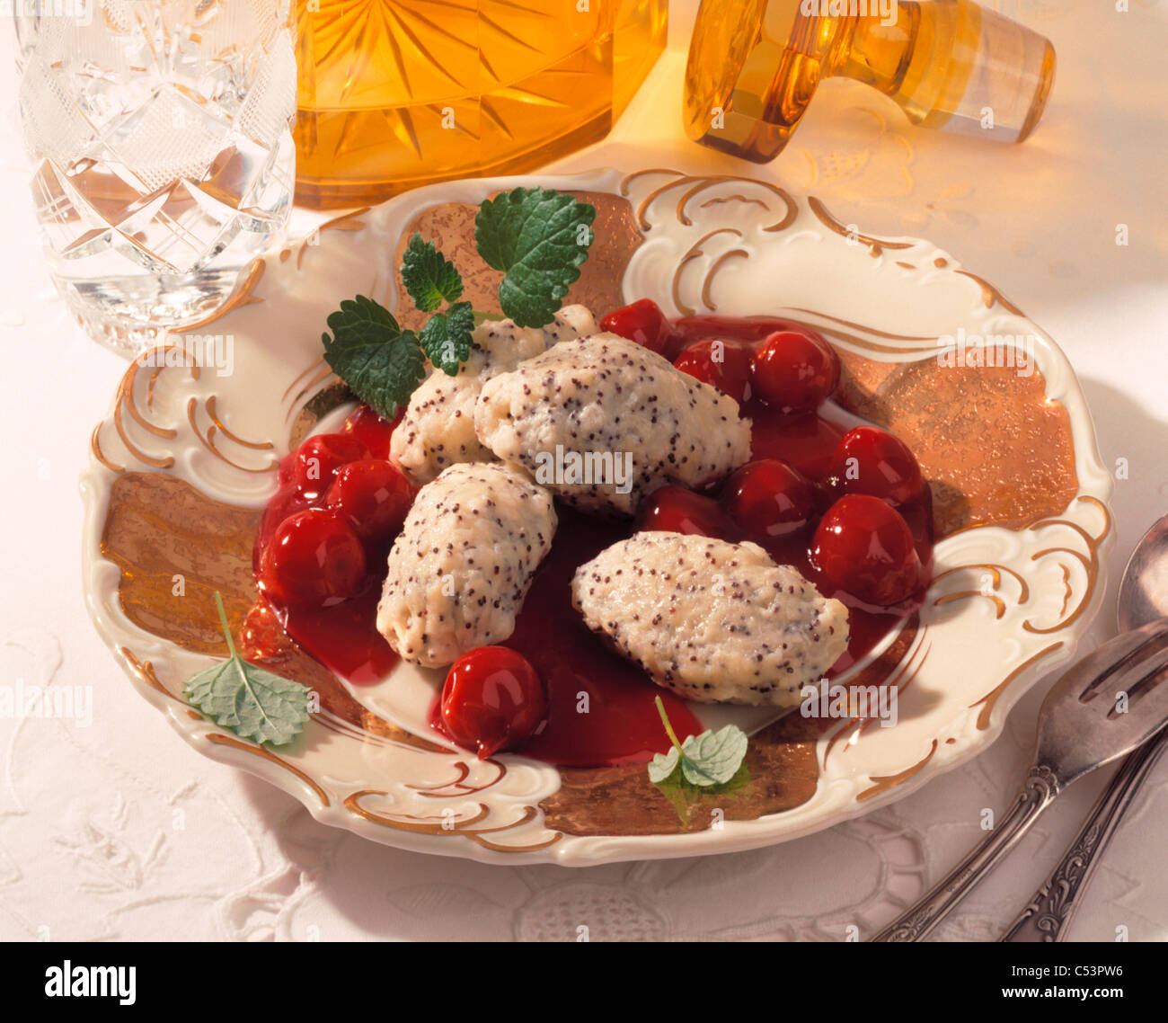 Rice - poppy dumplings with cherry sauce Stock Photo - Alamy