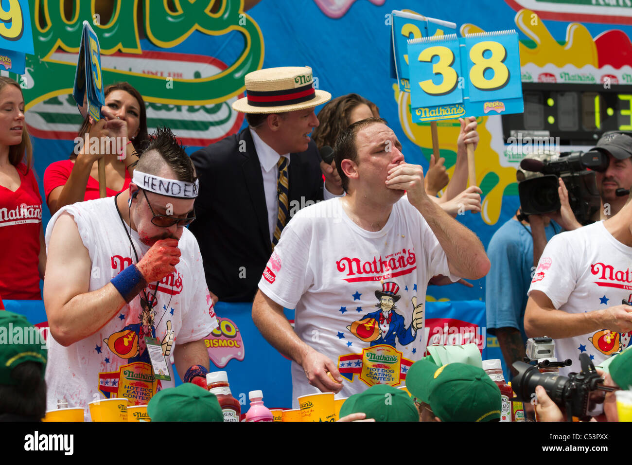 Patrick Bertoletti (L) and winner Joey Chestnut in the 2011 Nathan's ...
