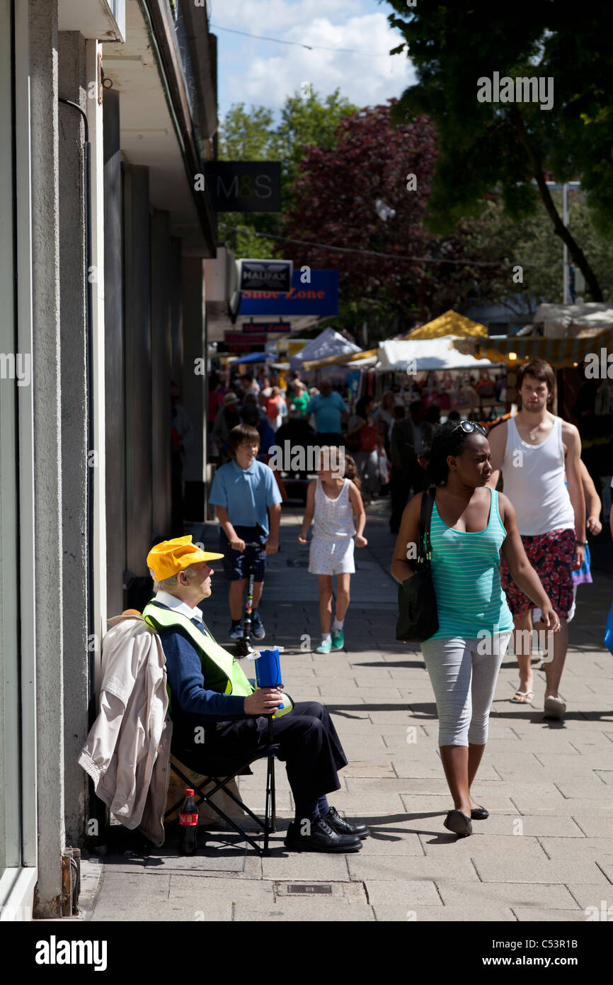 High street charity collector hi-res stock photography and images - Alamy