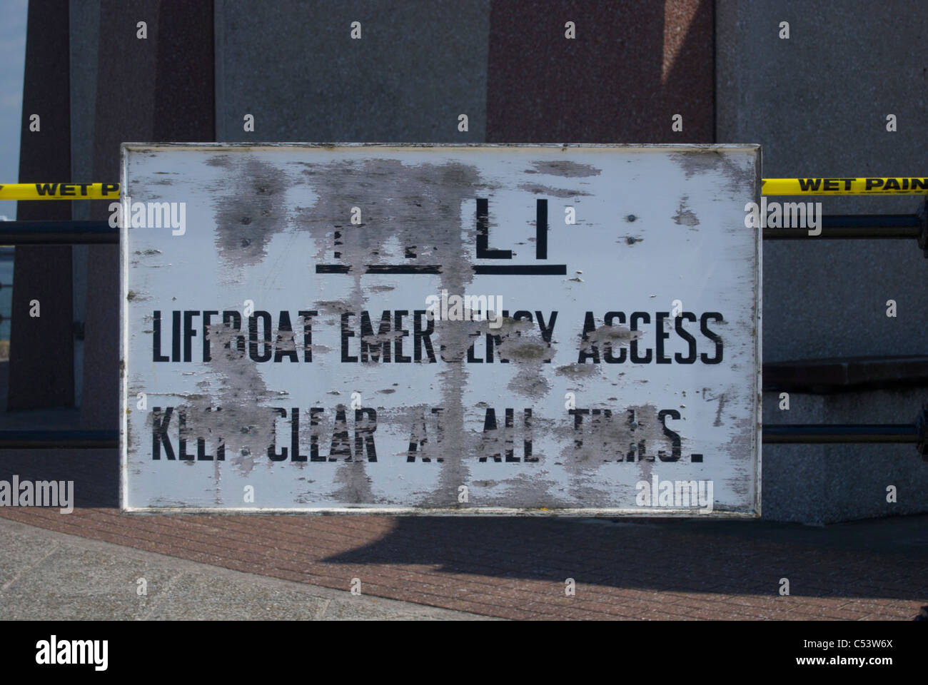 worn away RNLI sign Stock Photo - Alamy