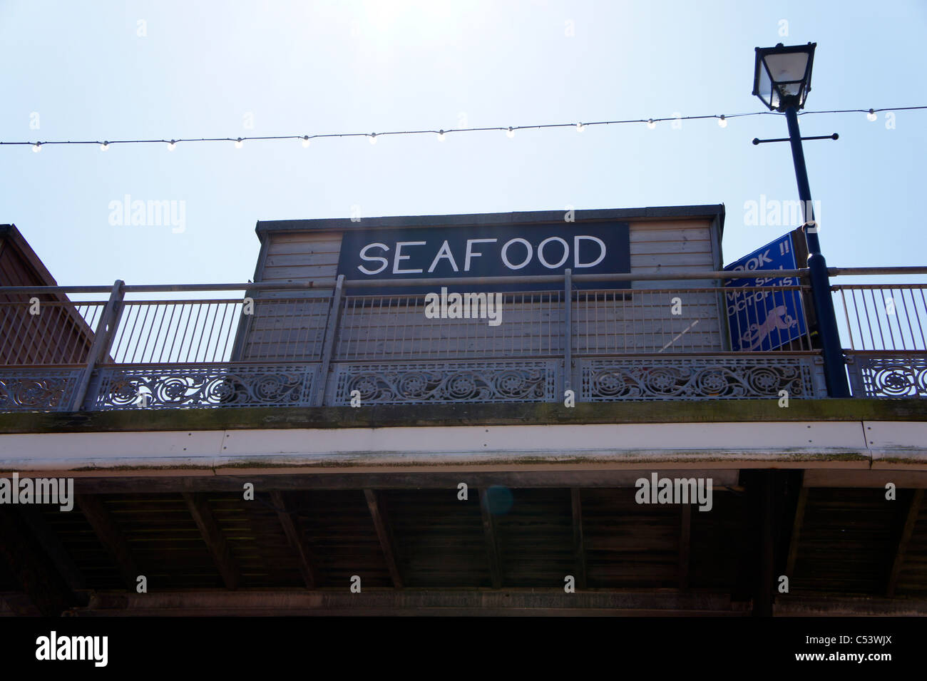 Seafood Sign and beach hut Stock Photo - Alamy