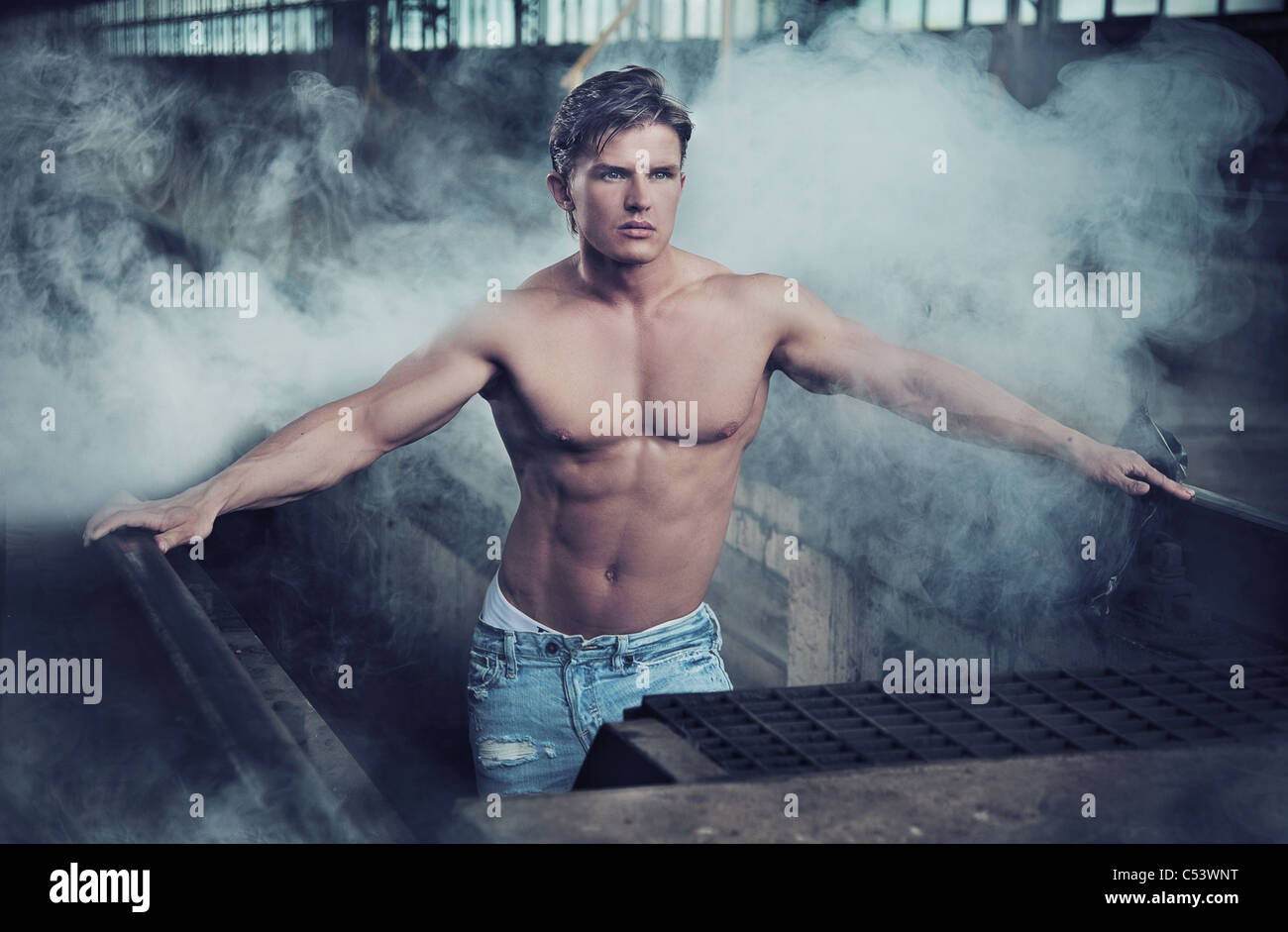 Handsome bodybuilder posing Stock Photo - Alamy