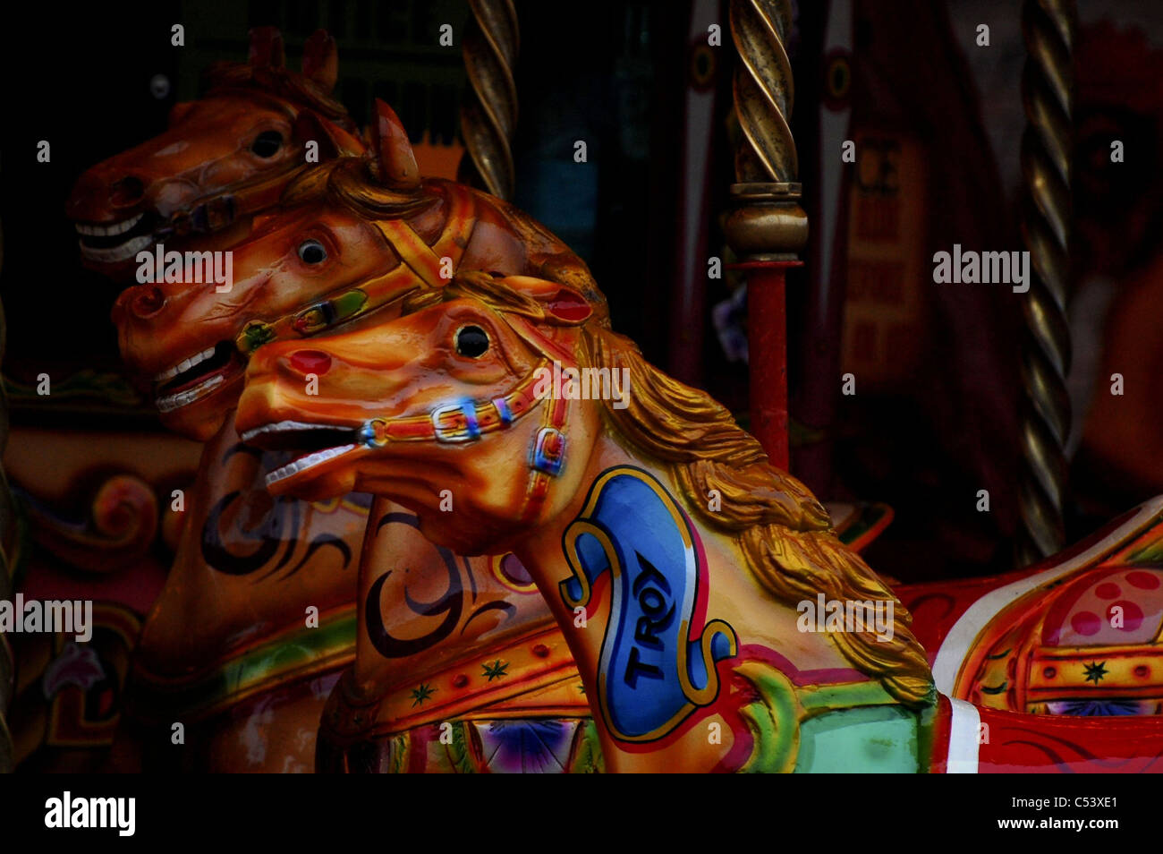Close up of 3 three carousel ride horse's heads in vertical line Stock ...