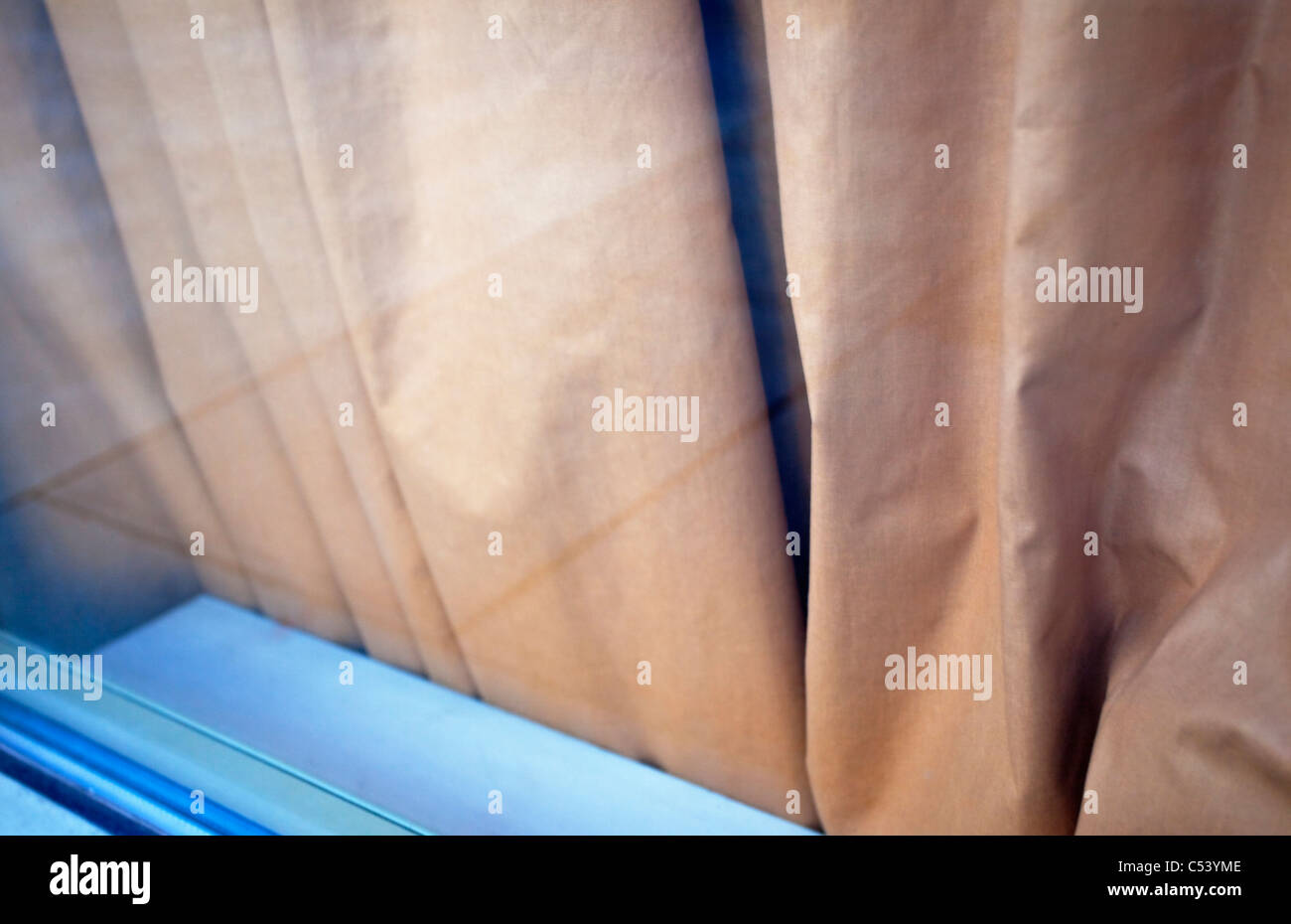 brown curtain in shop window Stock Photo - Alamy