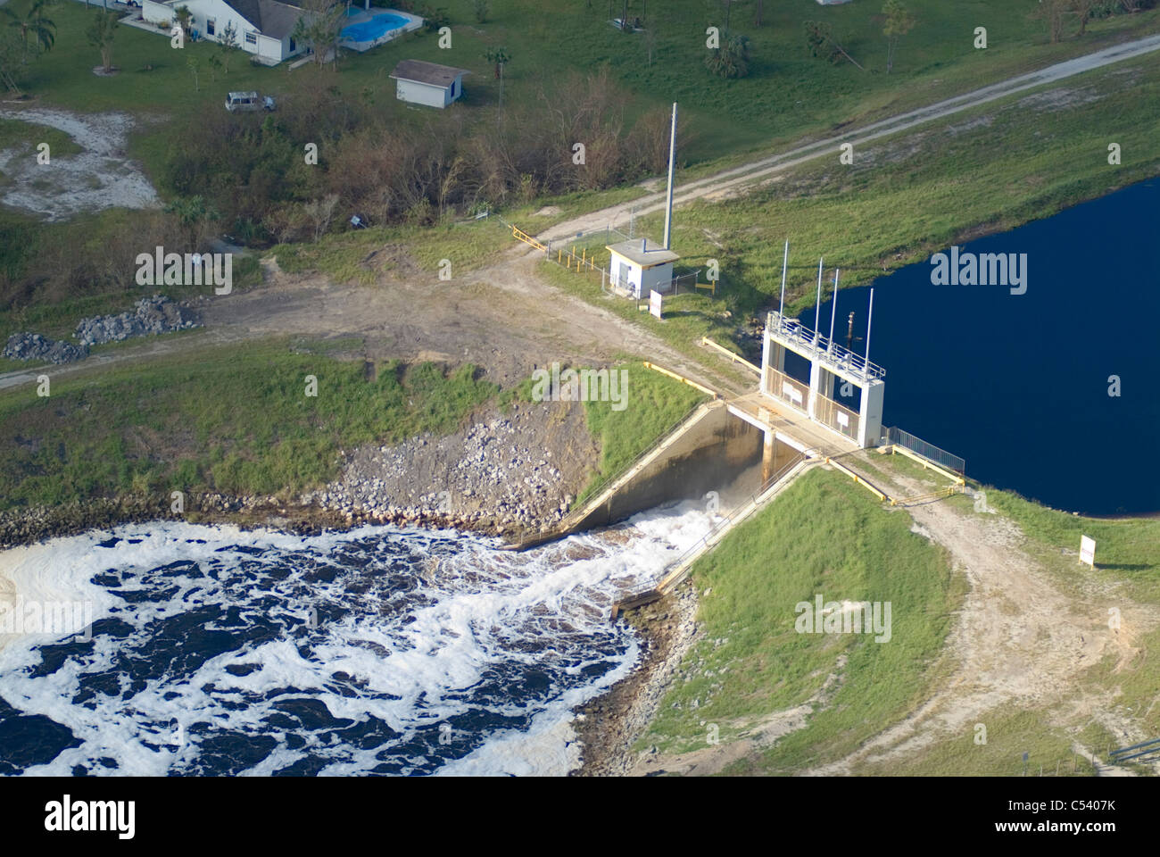 open water control gate structure on Florida canal Stock Photo - Alamy