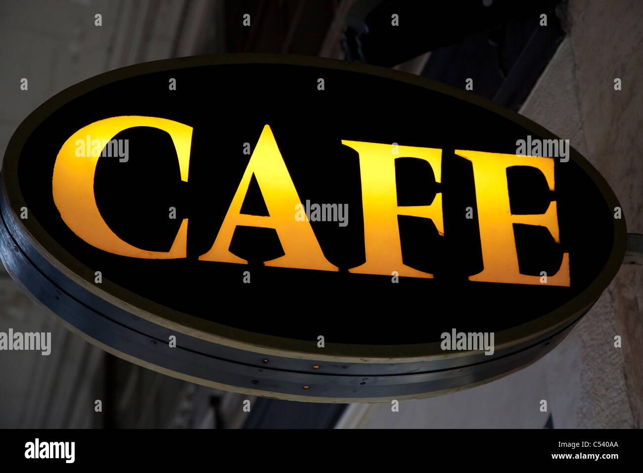 Illuminated Cafe Sign in Paris, France Stock Photo - Alamy