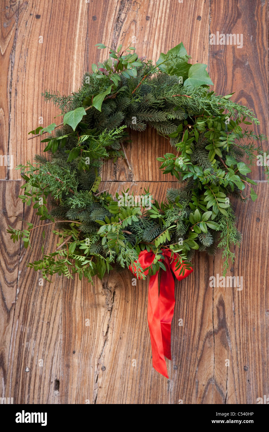Simple Christmas Reef on Wooden Door in Mallorca, Spain Stock Photo - Alamy