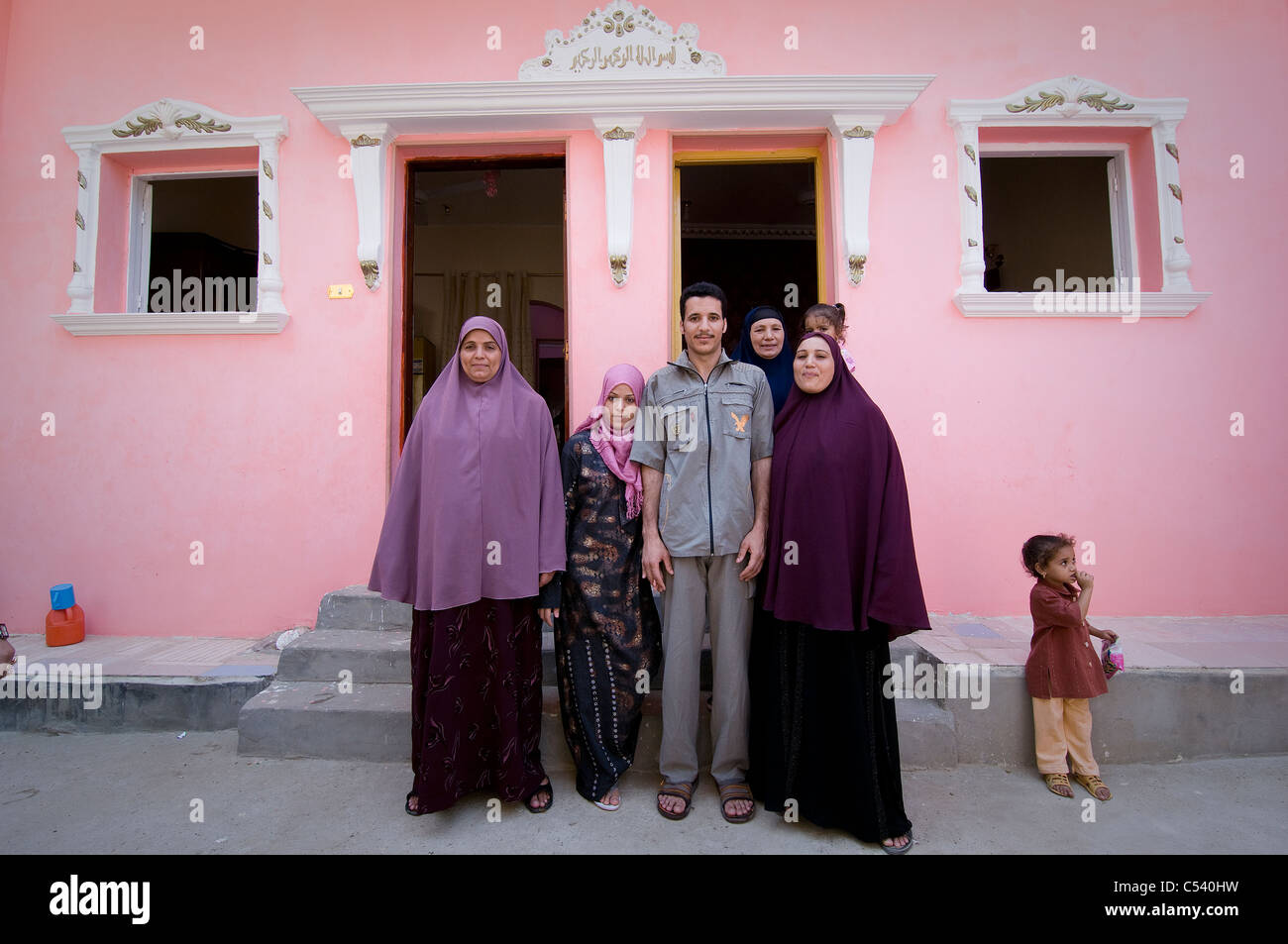Family members in village in hi-res stock photography and images - Alamy