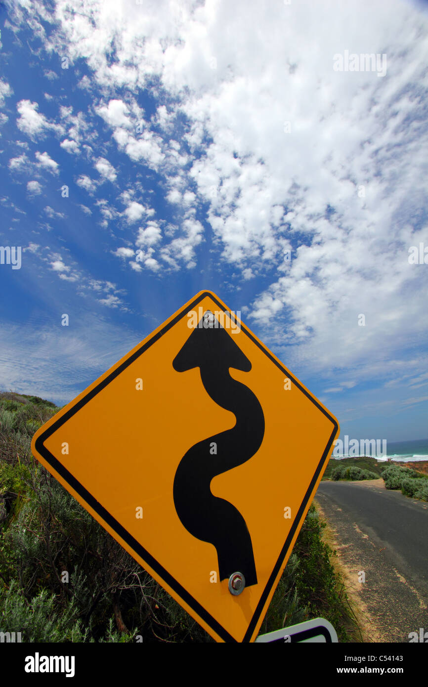 ROAD WARNING SIGN WOBBLY ARROW WARNING SKY BACKGROUND BDB Stock Photo ...