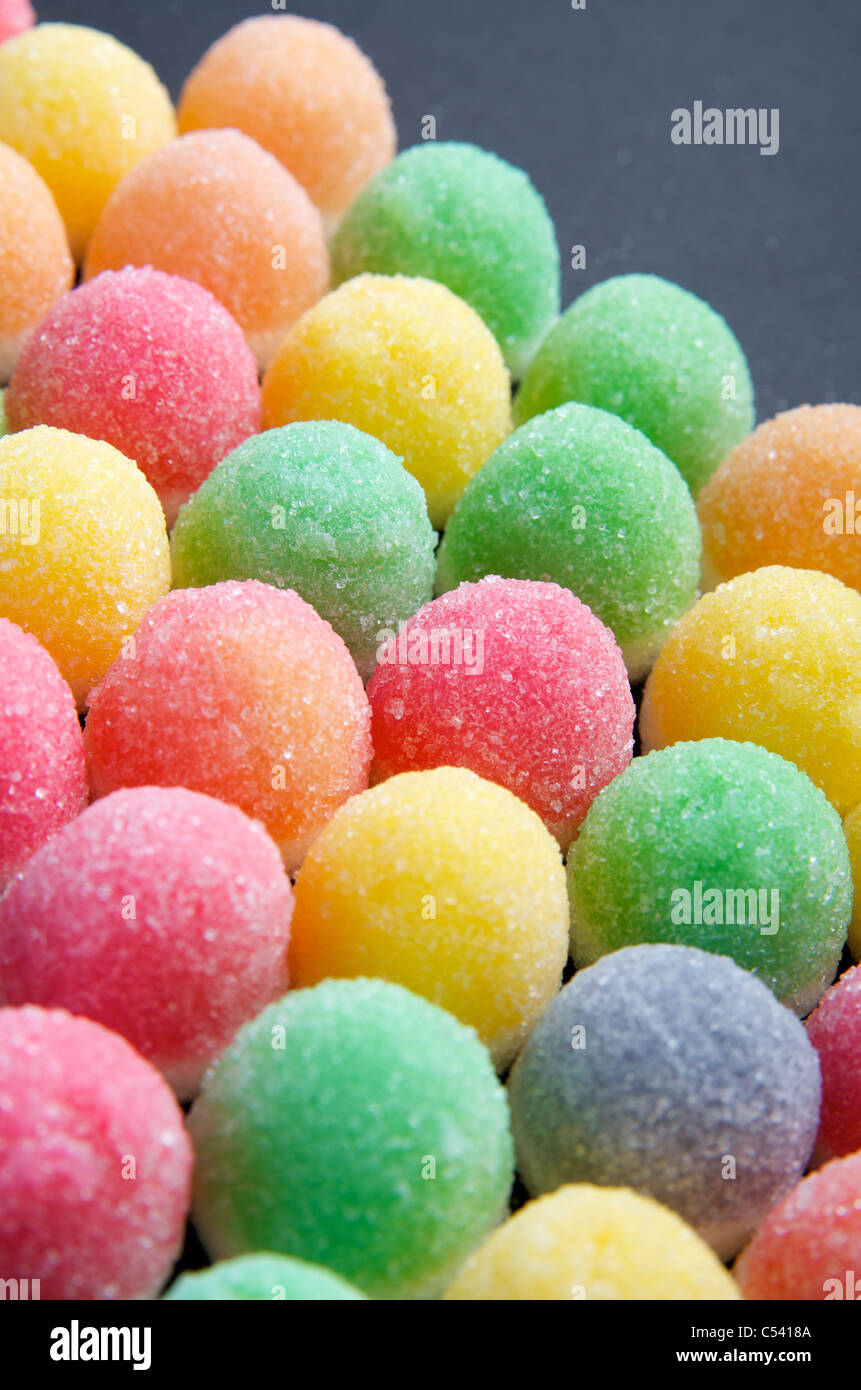 aligned group of differenet colors of jelly beans Stock Photo - Alamy