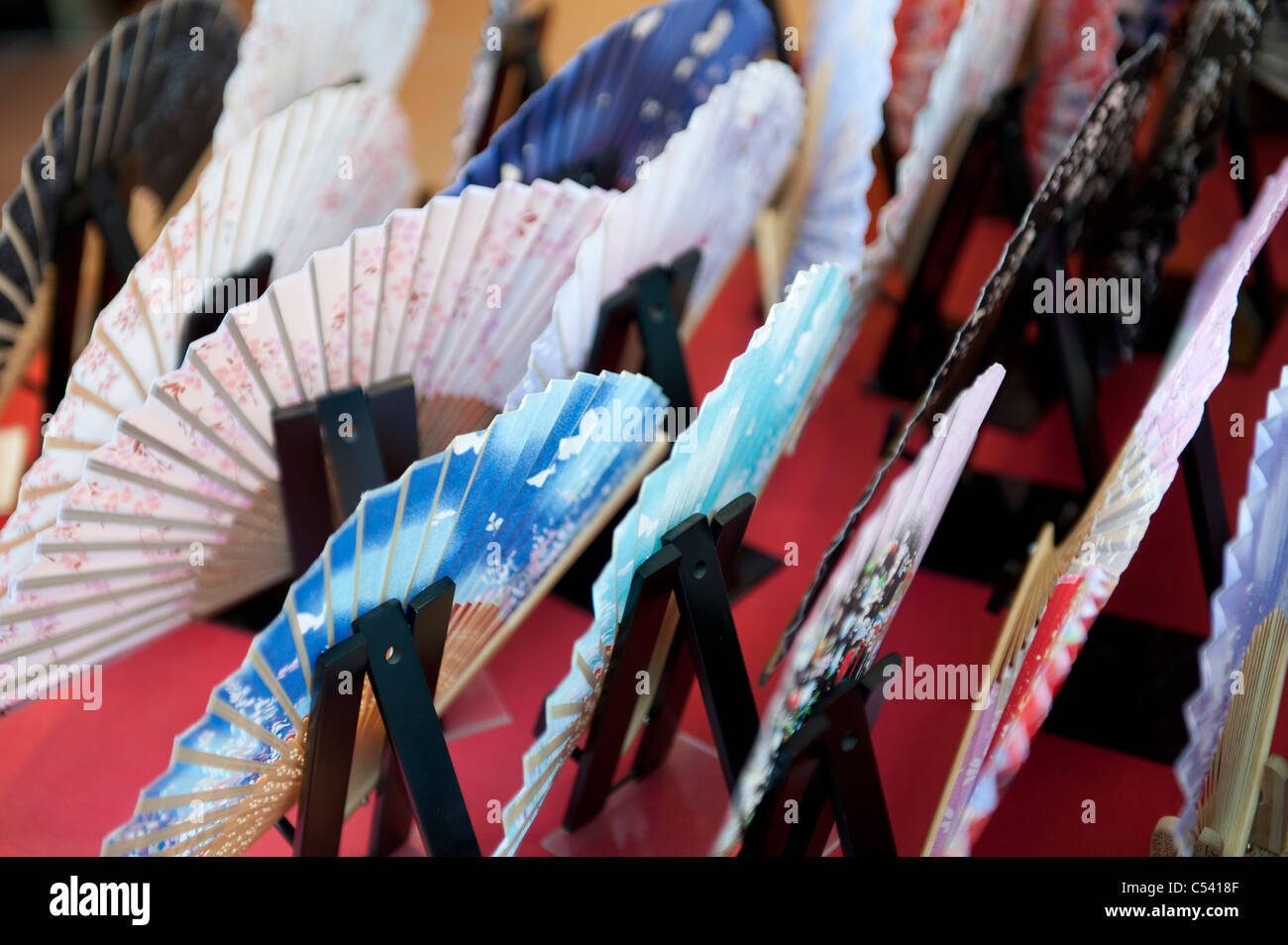 Close-up of colorful Japanese folding fans at Kiyomizu-Dera Temple ...