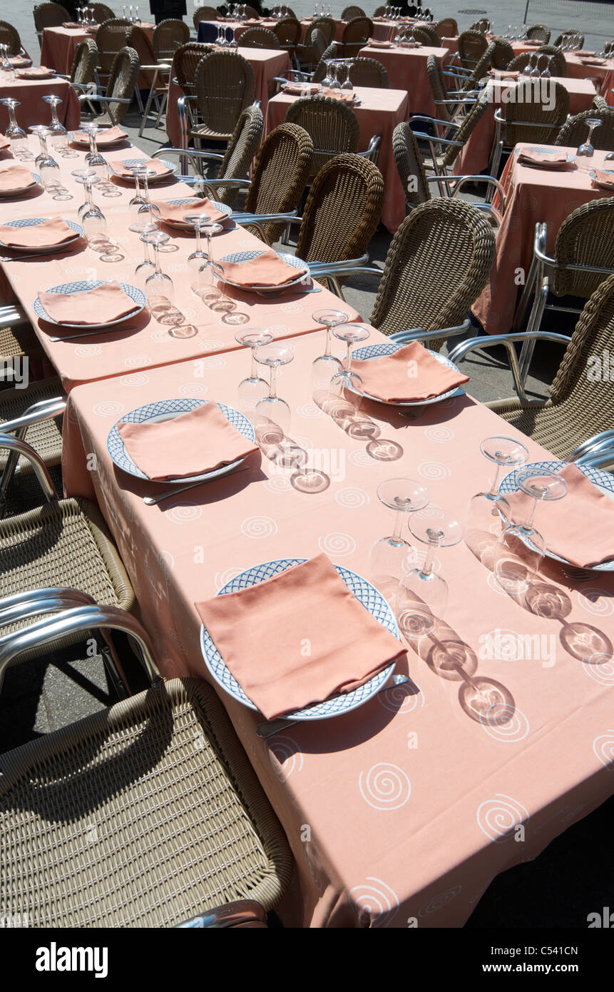 group of tables outdoor restaurant ready to be served Stock Photo - Alamy