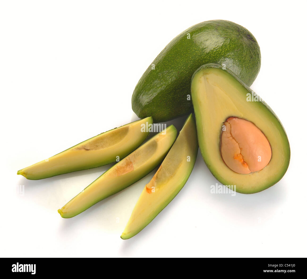Ripe sliced avocado isolated on white background Stock Photo - Alamy