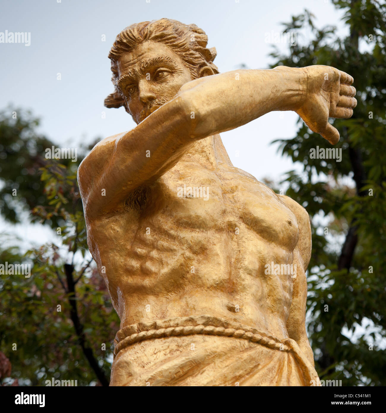 Golden statue of a man at Nagasaki Atomic Bomb Museum, Nagasaki, Japan ...