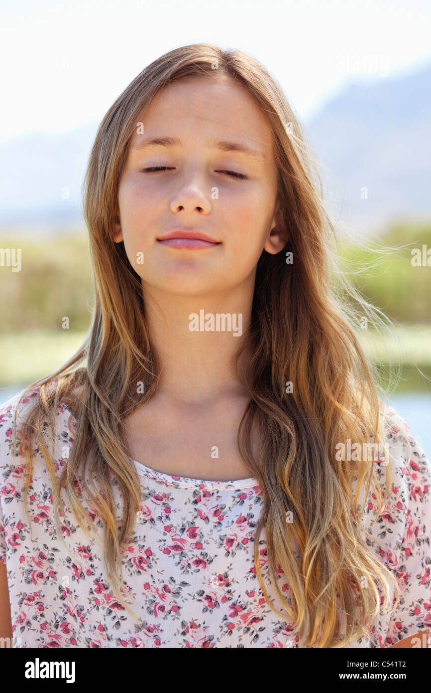 Close-up of a girl thinking Stock Photo - Alamy