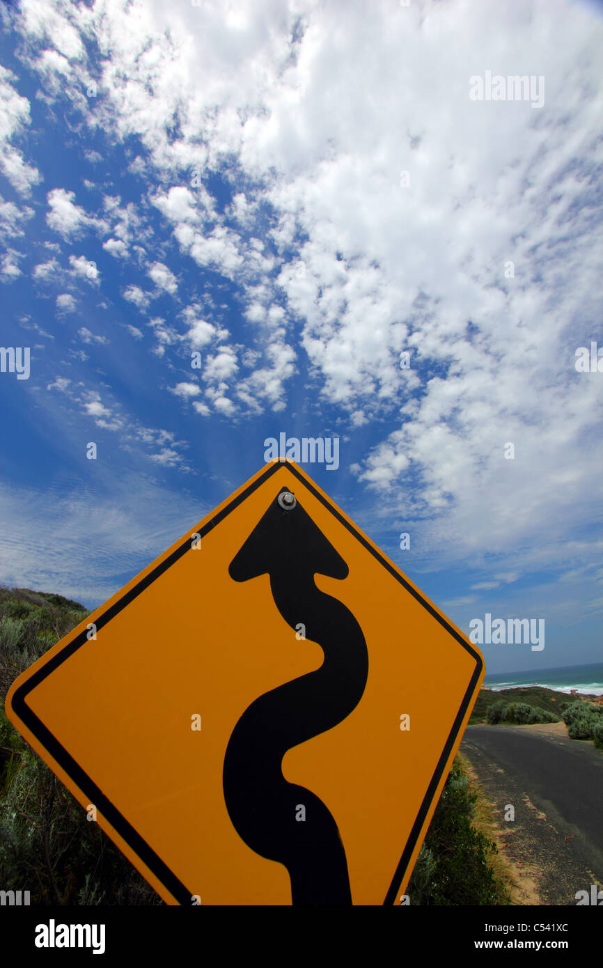 ROAD WARNING SIGN WOBBLY ARROW WARNING SKY BACKGROUND BDB Stock Photo ...