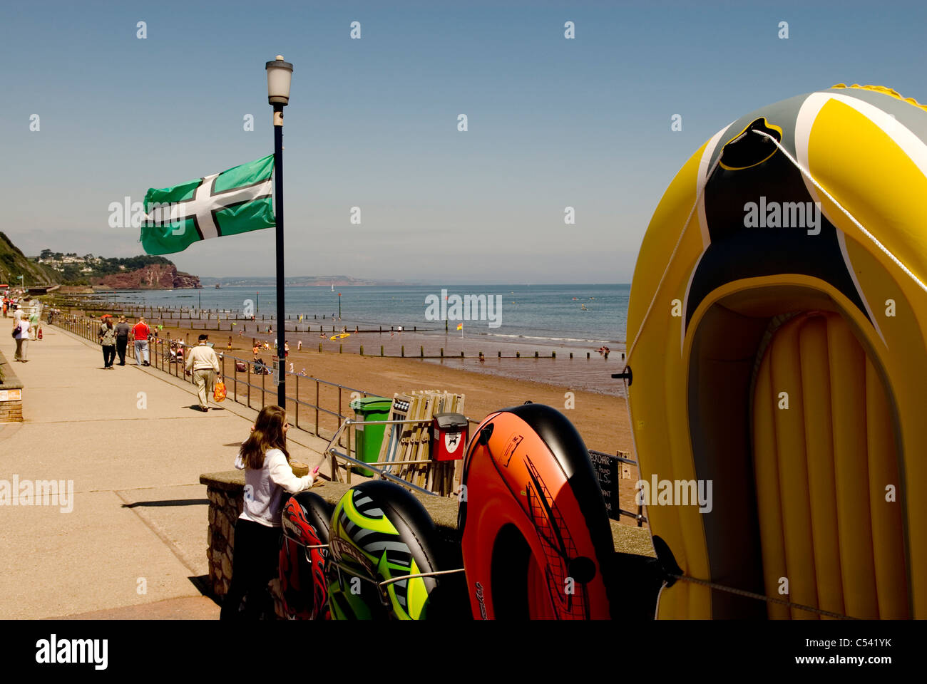 Rubber dingies, Devonian flag, esplanade, beach and coastline ...