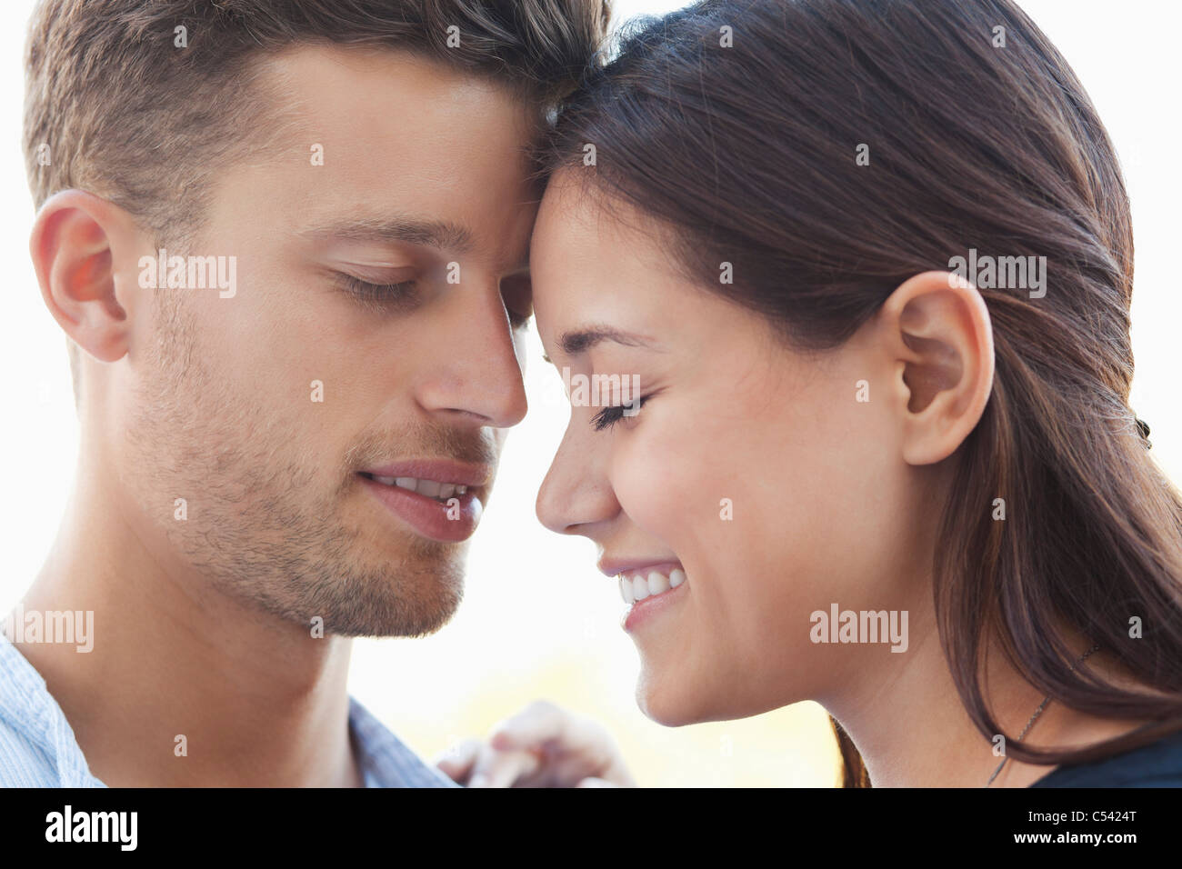 Close-up of a romantic couple Stock Photo - Alamy