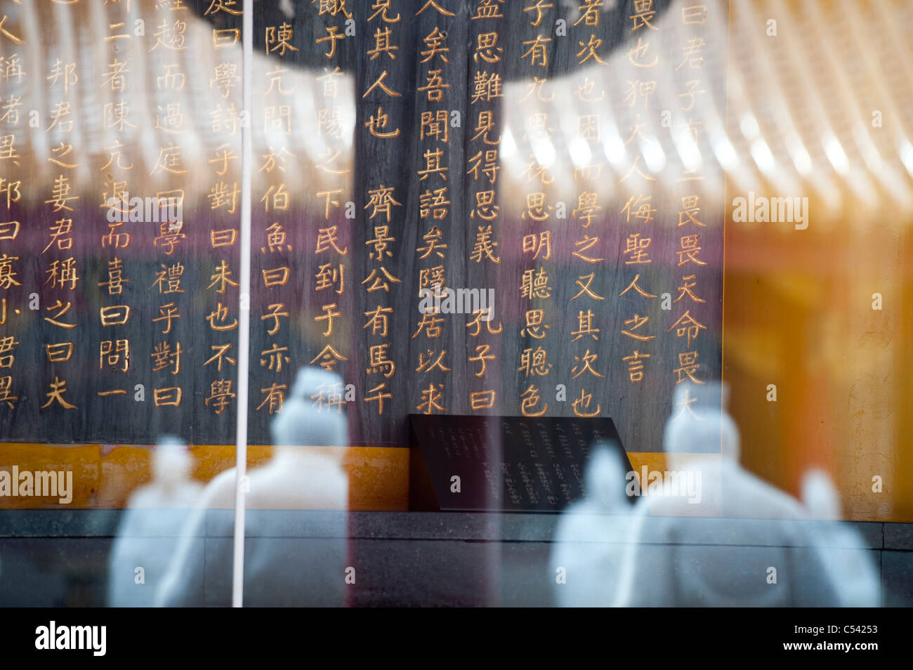 Reflection of statues on a glass window of Chinese Historical Museum ...