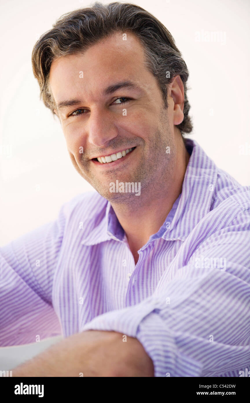 Portrait of a mid adult man smiling Stock Photo - Alamy