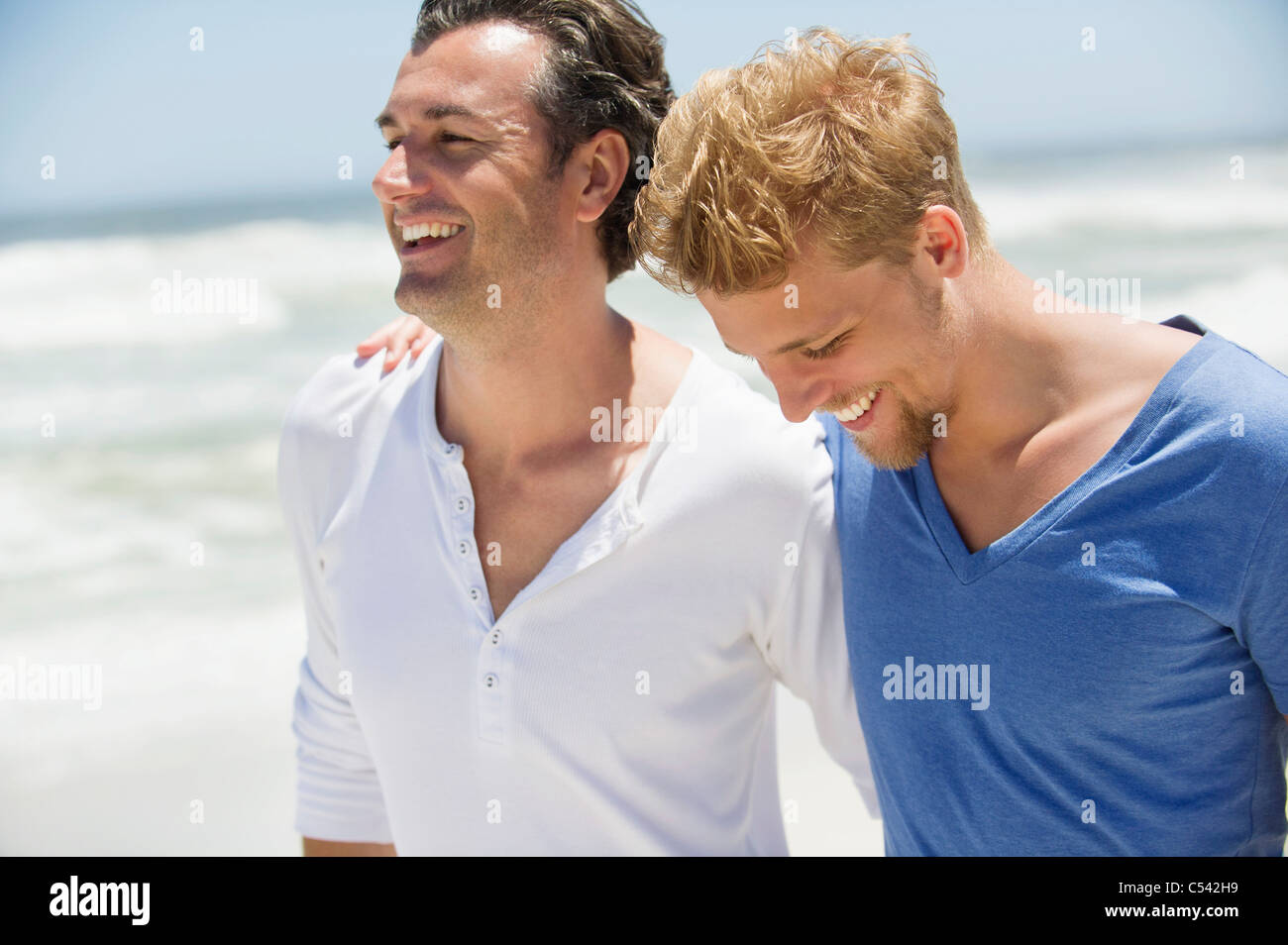 Two men laughing together Stock Photo - Alamy
