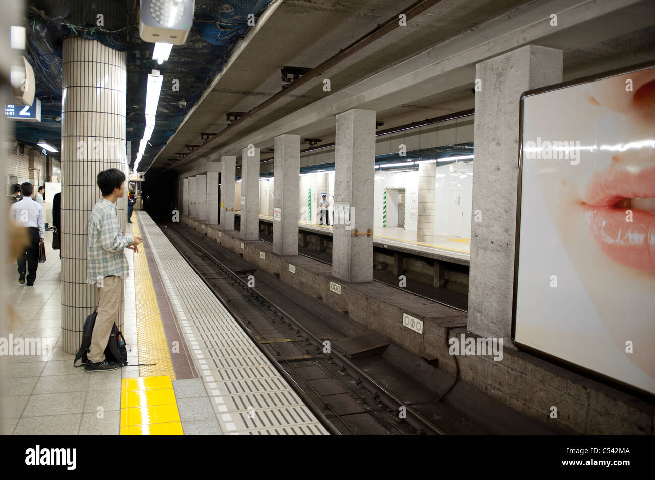 Passengers at a subway station, Tokyo, Japan Stock Photo - Alamy