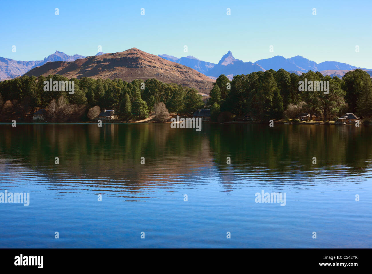 View over lake Naverone with Rhino peak in the Southern Drakensberg in ...