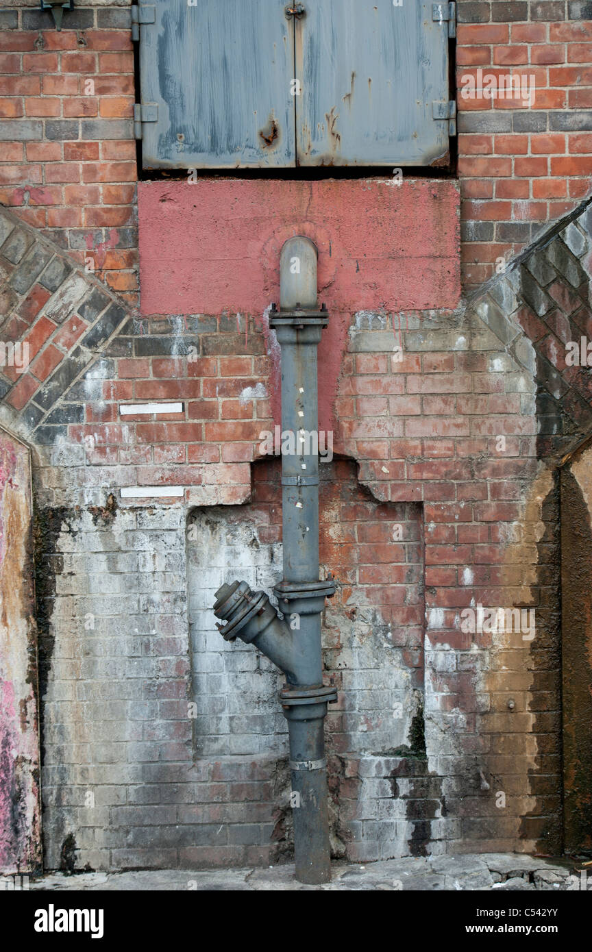 Pipe mounted on a wall, Ginza, Chuo Ward, Tokyo, Japan Stock Photo - Alamy