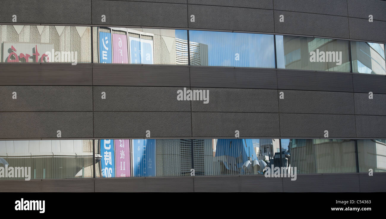 Reflection of buildings on window glasses, Tokyo, Japan Stock Photo - Alamy