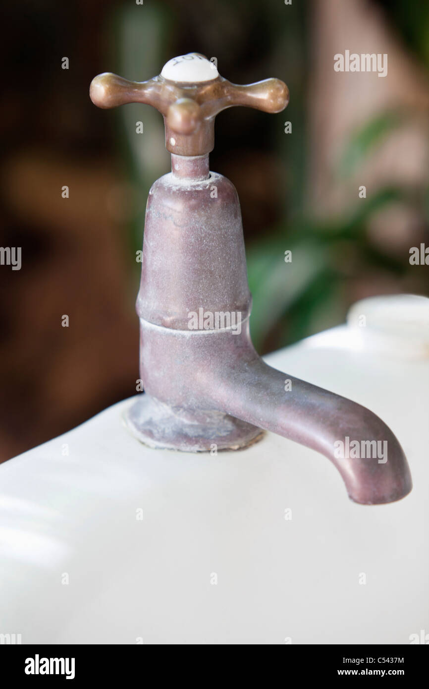 Close-up of a brass faucet Stock Photo - Alamy