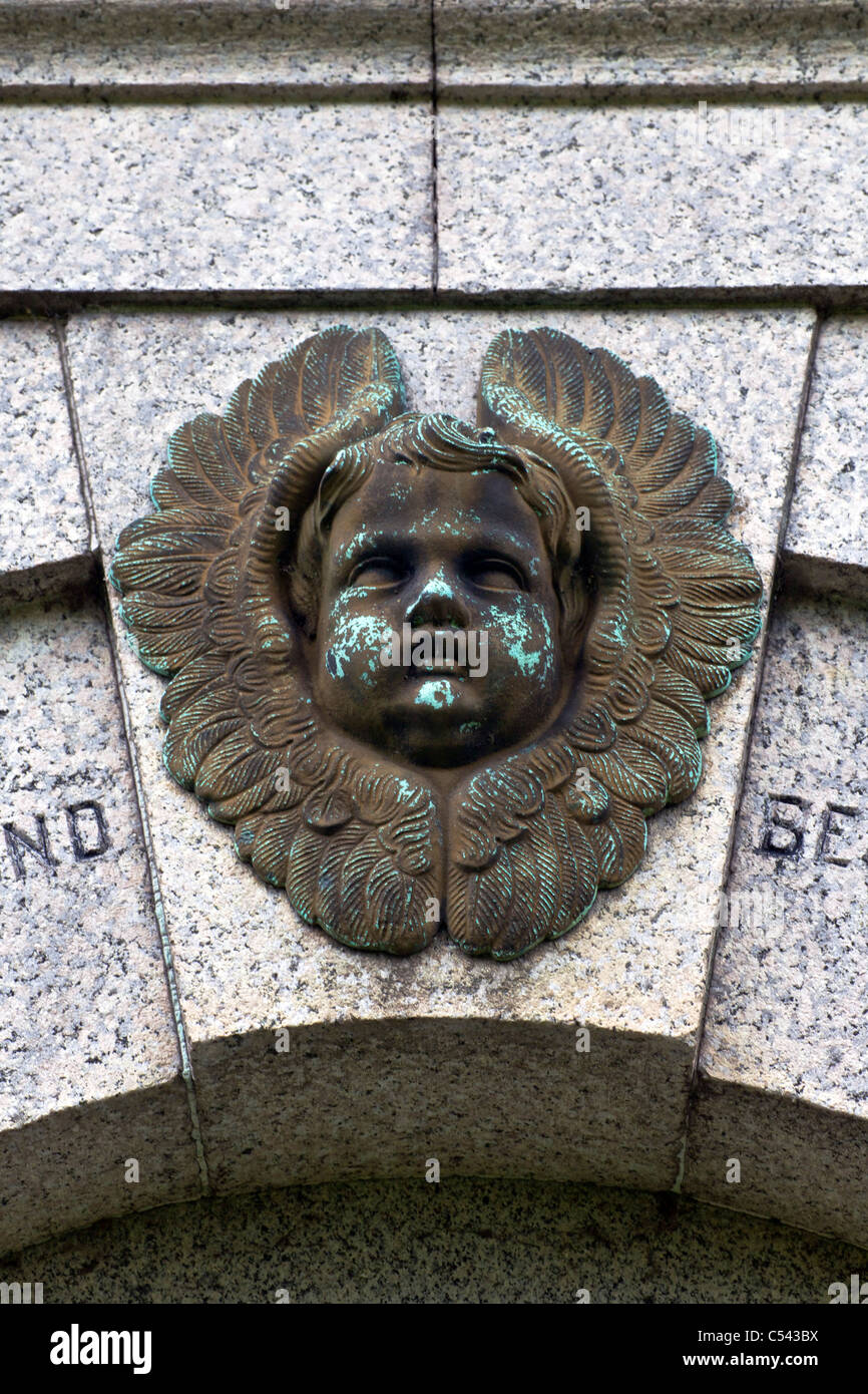 Cherub's face on a tomb in the Necropolis, Glasgow, Scotland, UK Stock ...